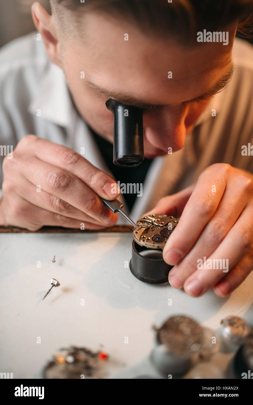 Watchmaker with loupe hi-res stock photography and images - Alamy