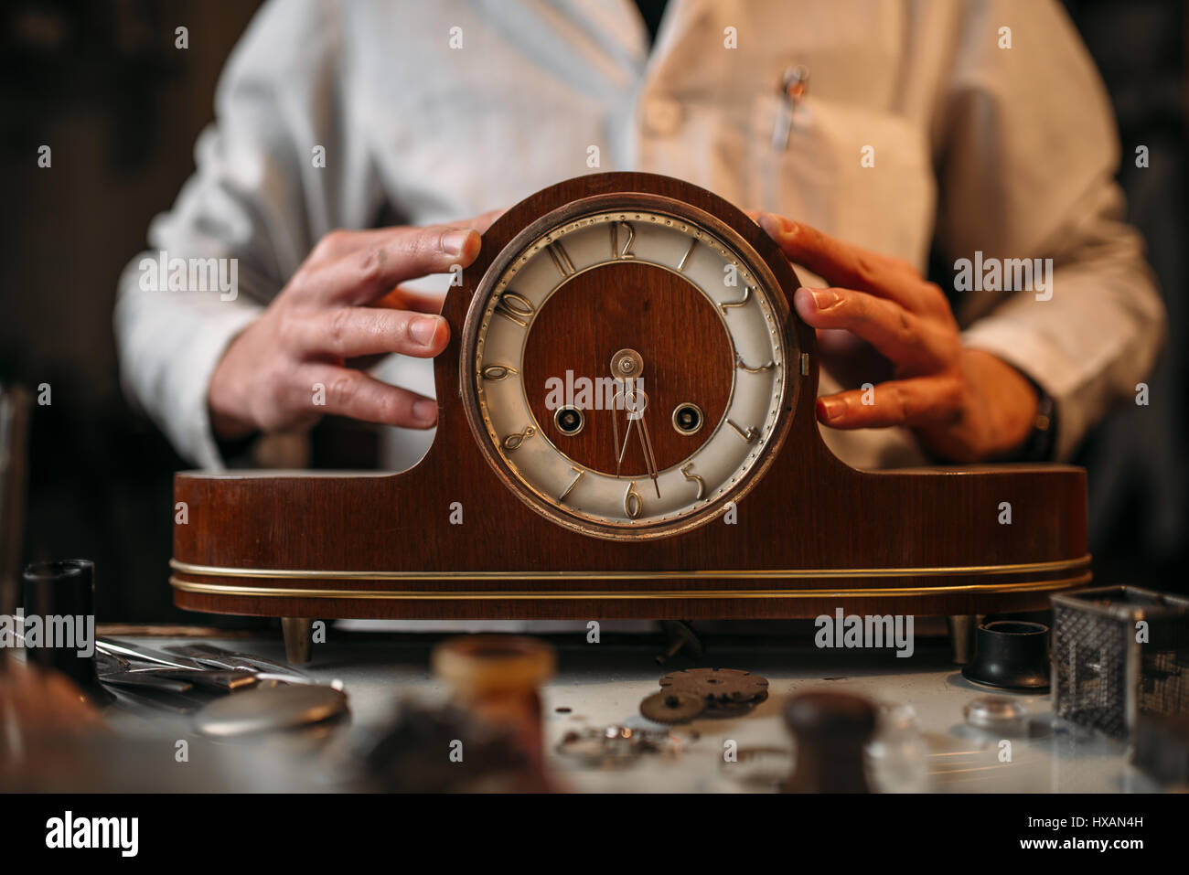 Mechanical wooden man clock hi-res stock photography and images - Alamy