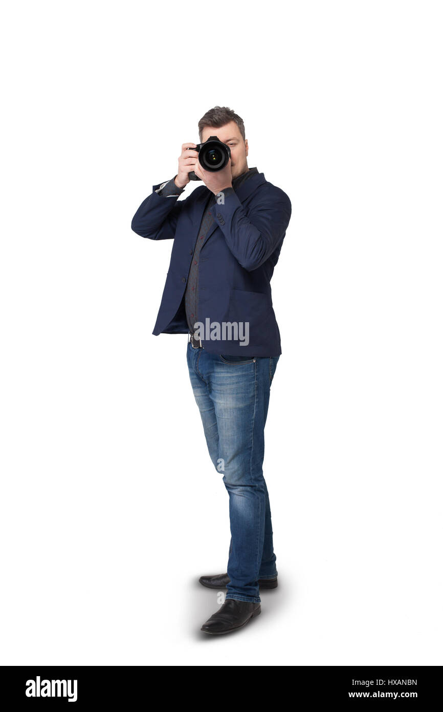 Portrait of male photographer with digital camera, front view, white ...