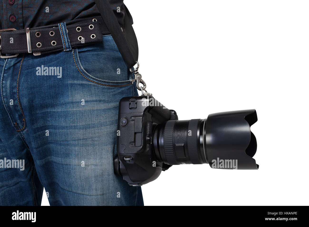 Male photographer legs with belt holding gigital camera with ...