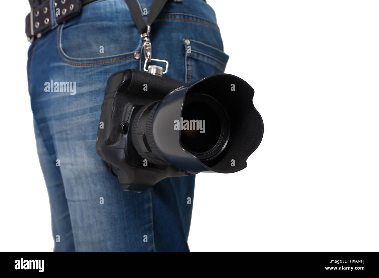 Male legs in jeans and belt holding gigital camera with professional ...