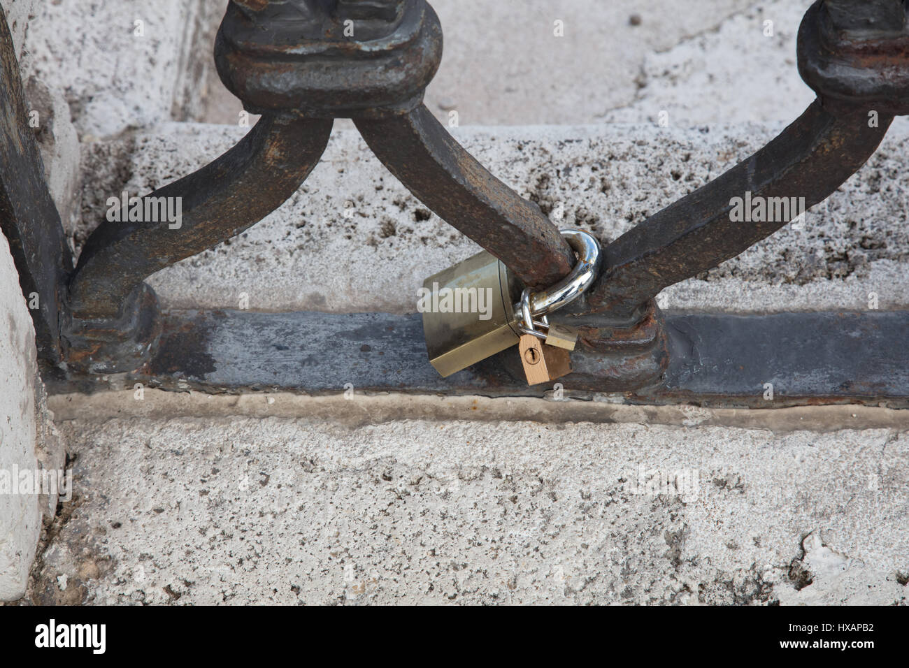 Two padlocks locked together hi-res stock photography and images - Alamy