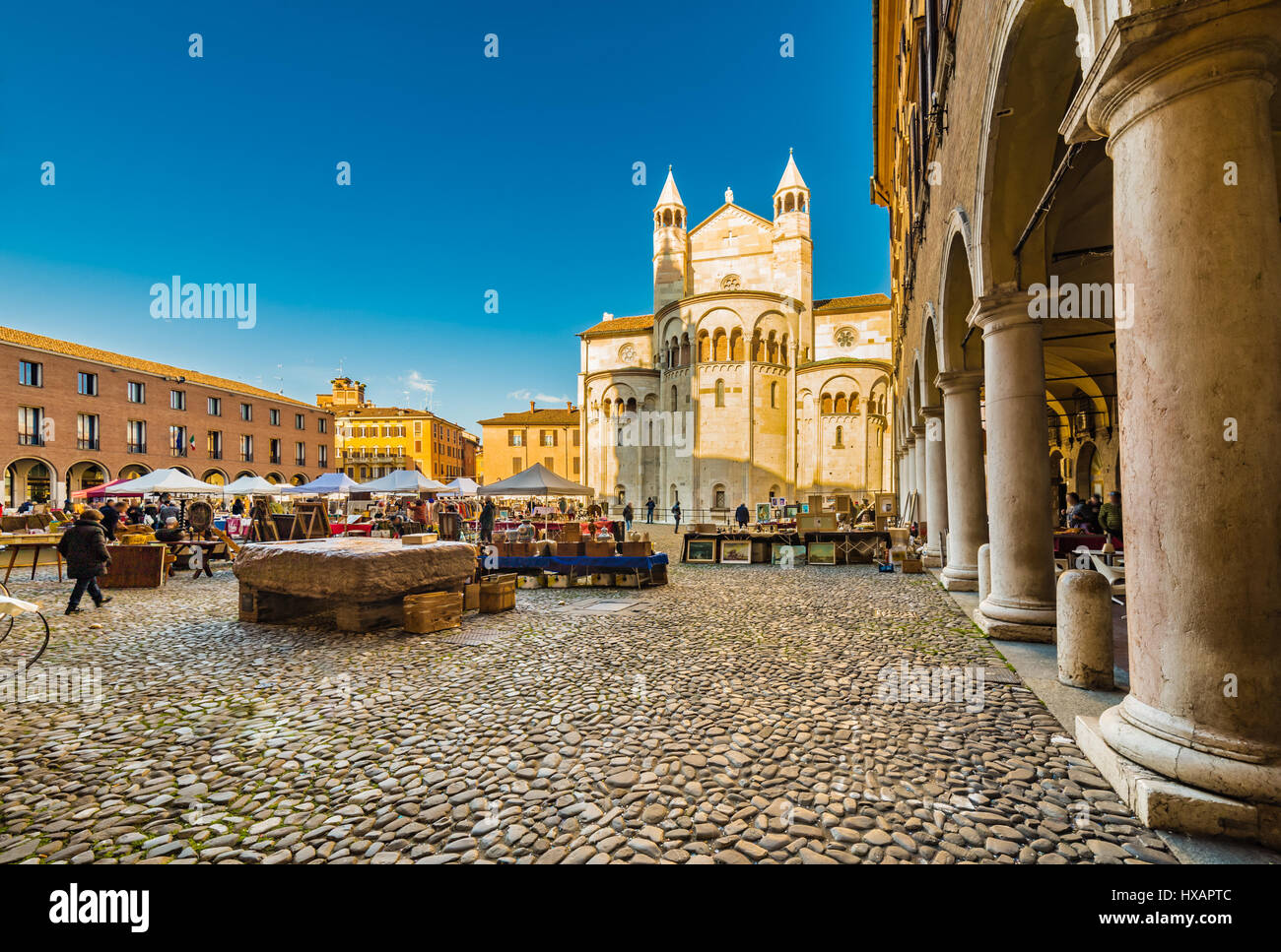stalls of antique market in the main square of Modena in Italy Stock ...