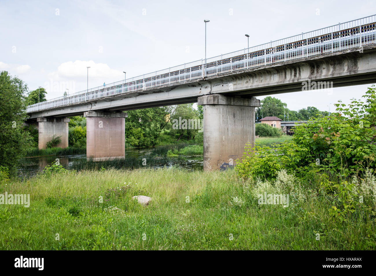 railway bridge with metal rails near river Stock Photo - Alamy