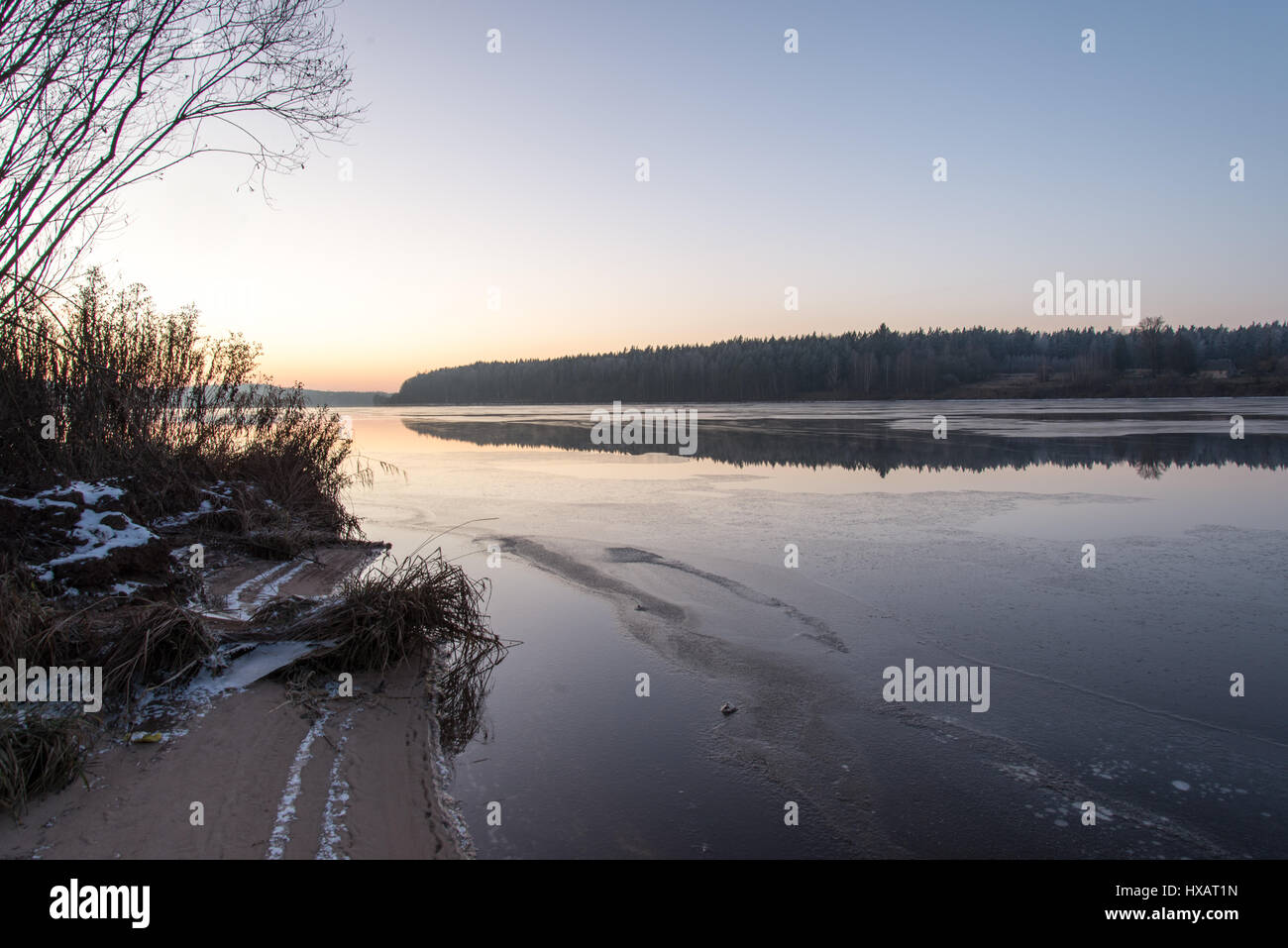 Beautiful winter landscape with frozen lake Stock Photo - Alamy