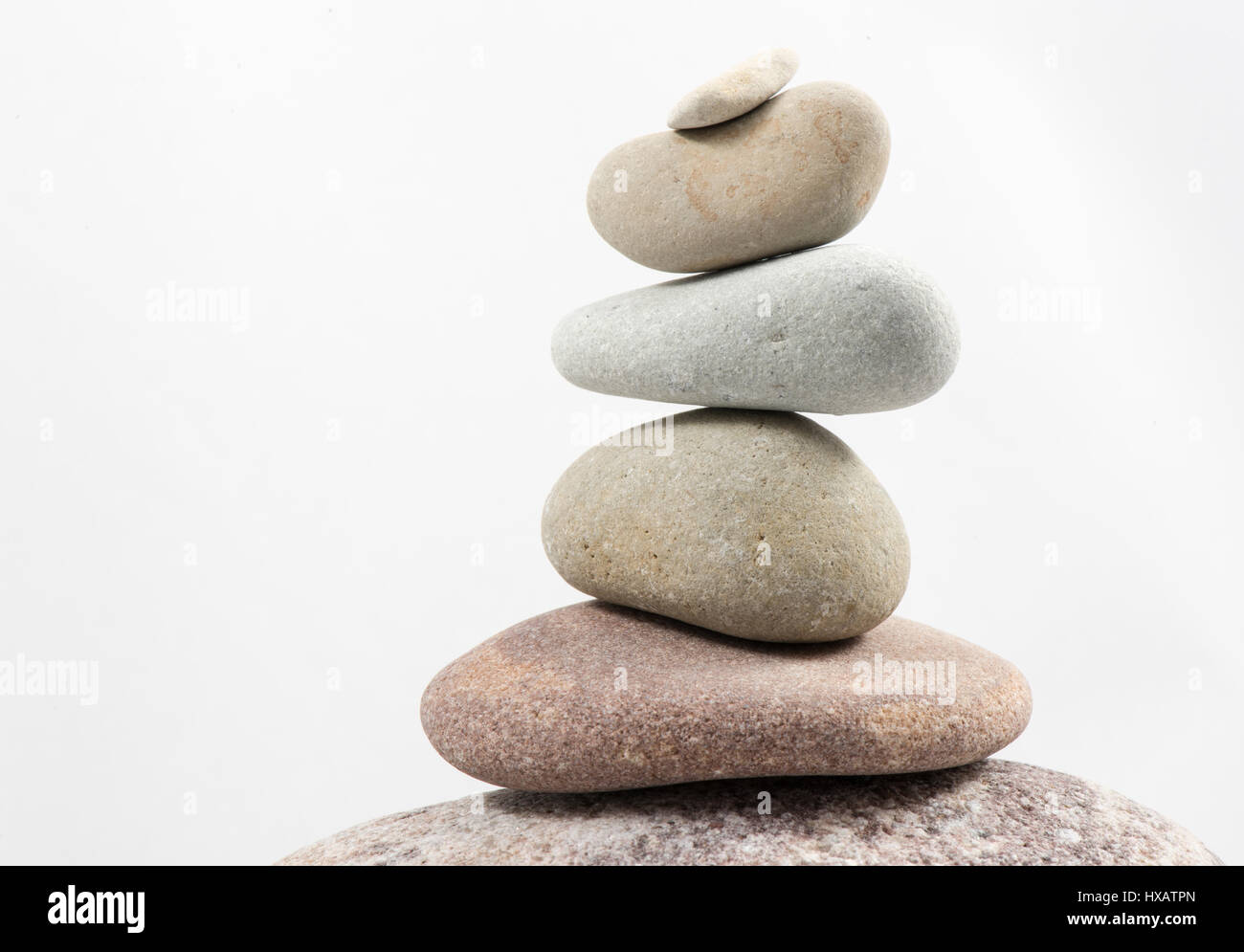 balancing stones isolated on white background. geology Stock Photo - Alamy