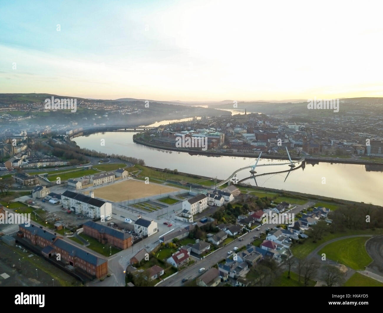 Peace Bridge at sunset spanning the River Foyle, Derry, Northern ...