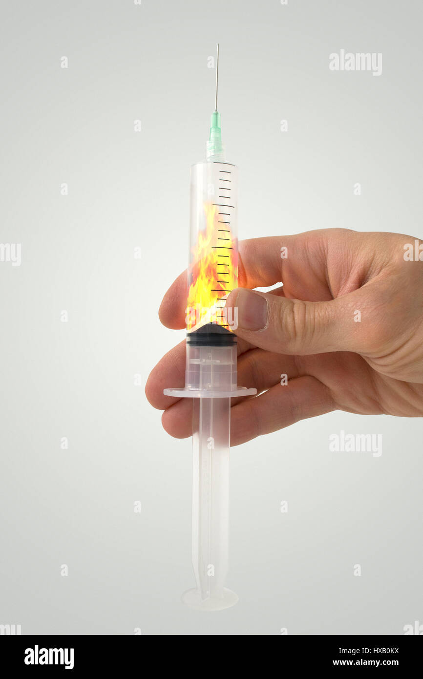 Fire inside a medical syringe Stock Photo - Alamy