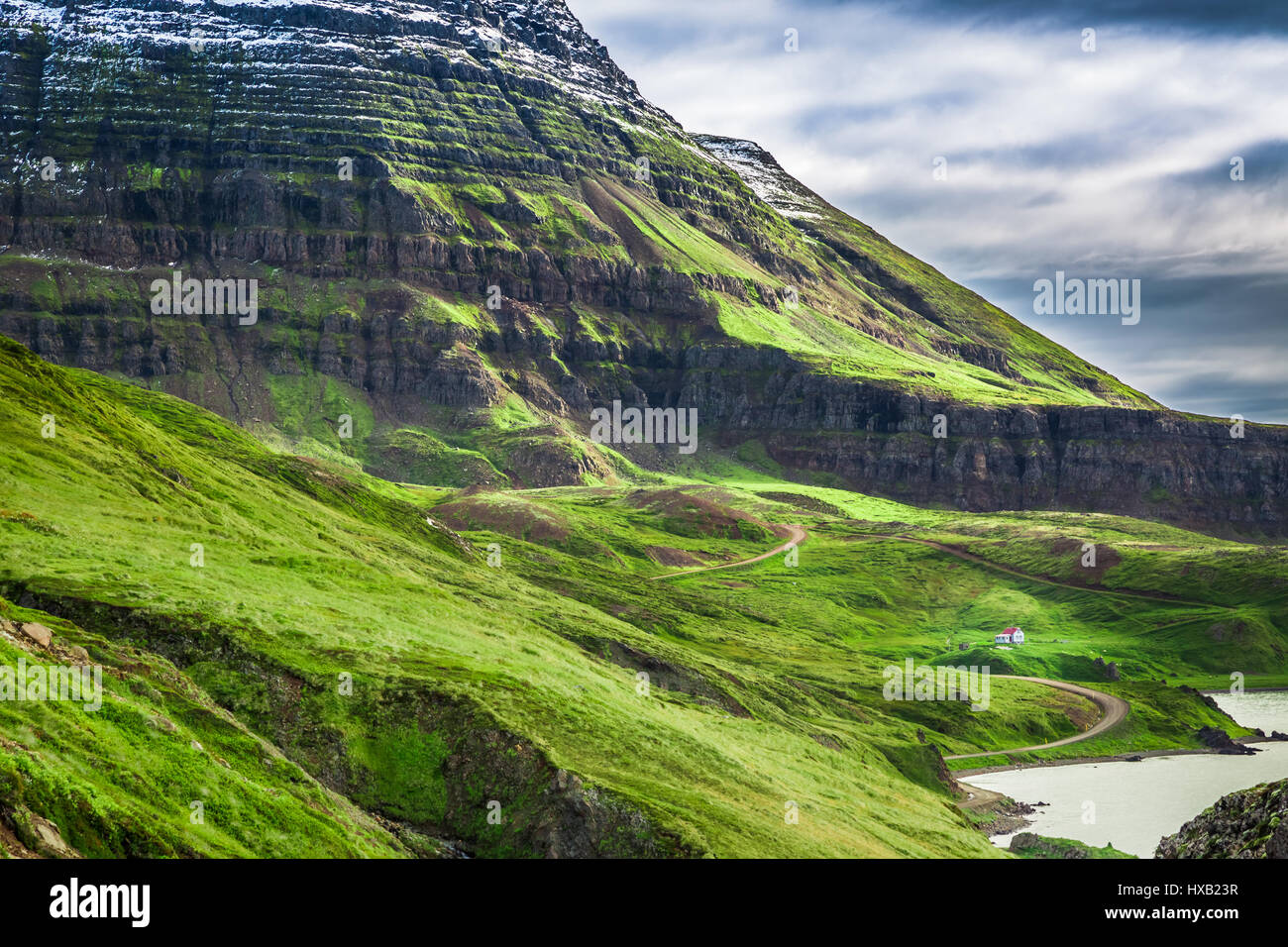 Green volcanic mountain in Iceland in summer Stock Photo - Alamy