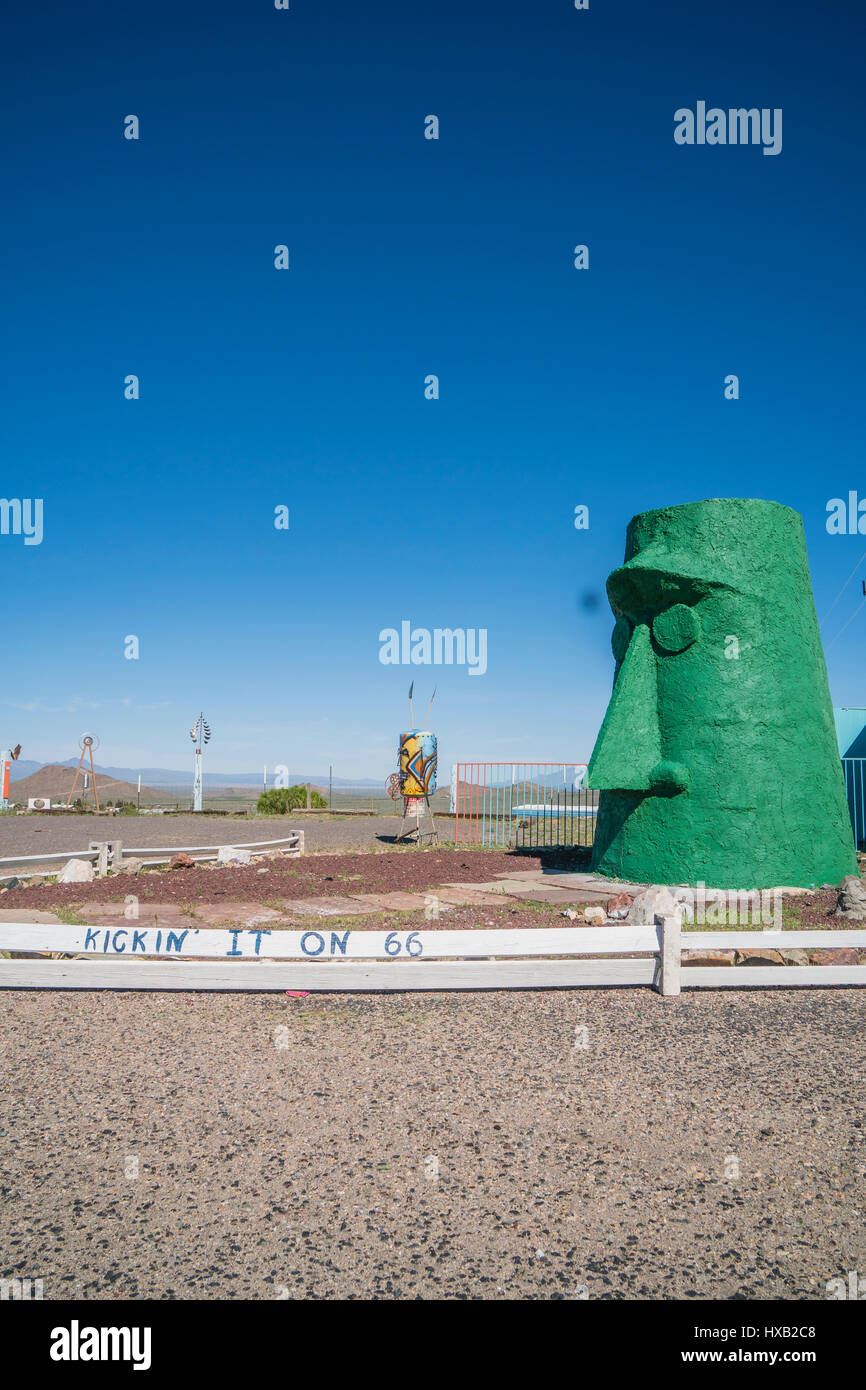 Huge green Easter Island type face located on historic US route 66 in ...