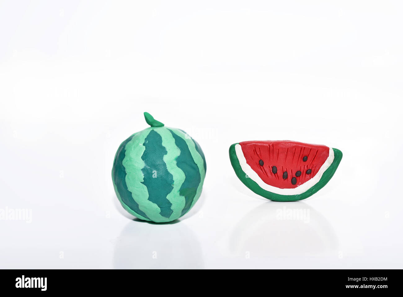 Fruits from plasticine. Isolated on white background Stock Photo - Alamy