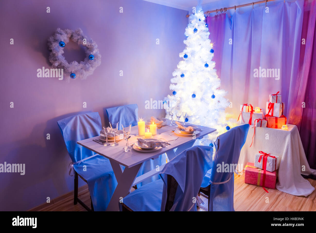 Beautiful Christmas table setting for Christmas eve Stock Photo - Alamy