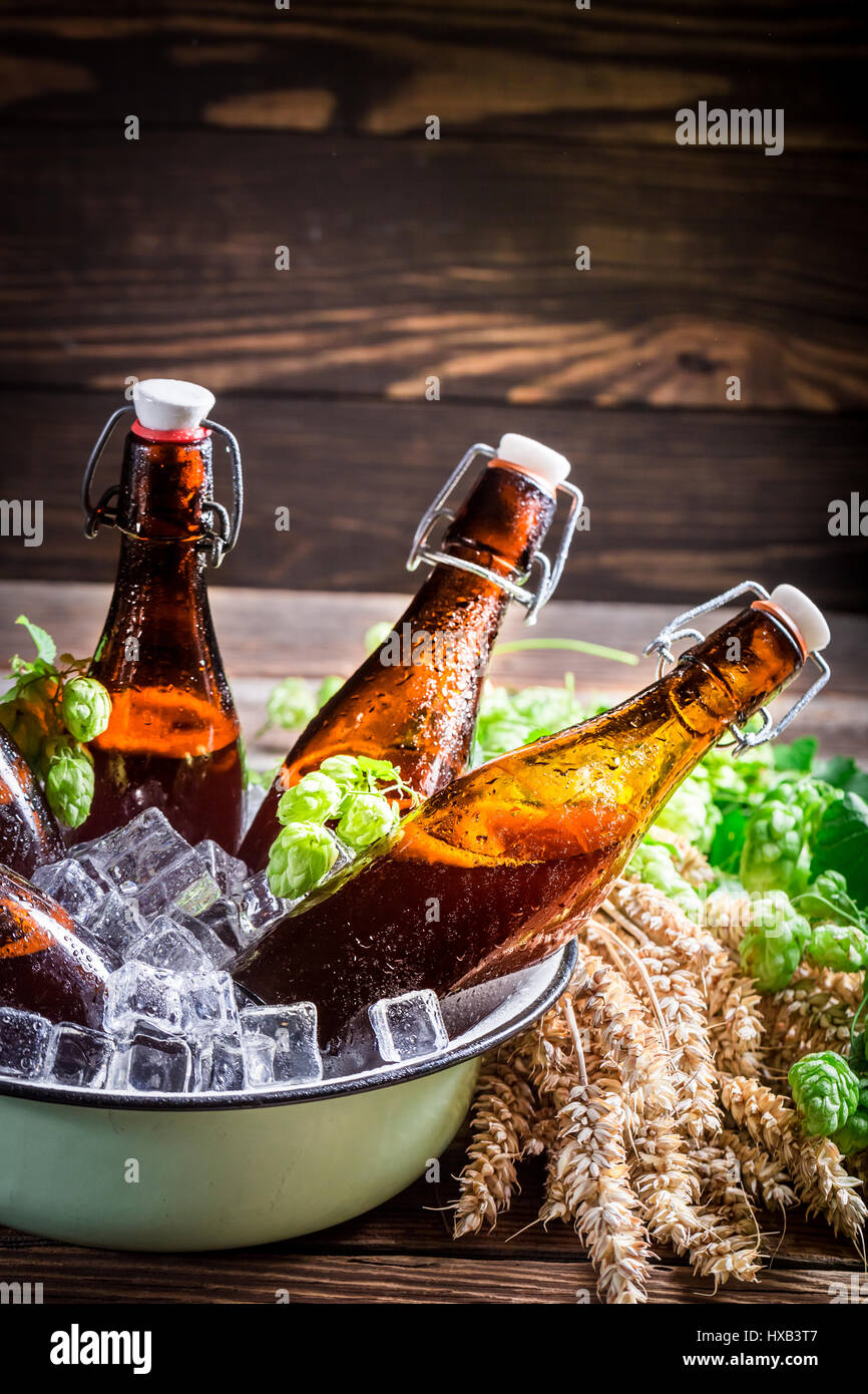 Fresh and cold cider beer on old wooden table Stock Photo - Alamy