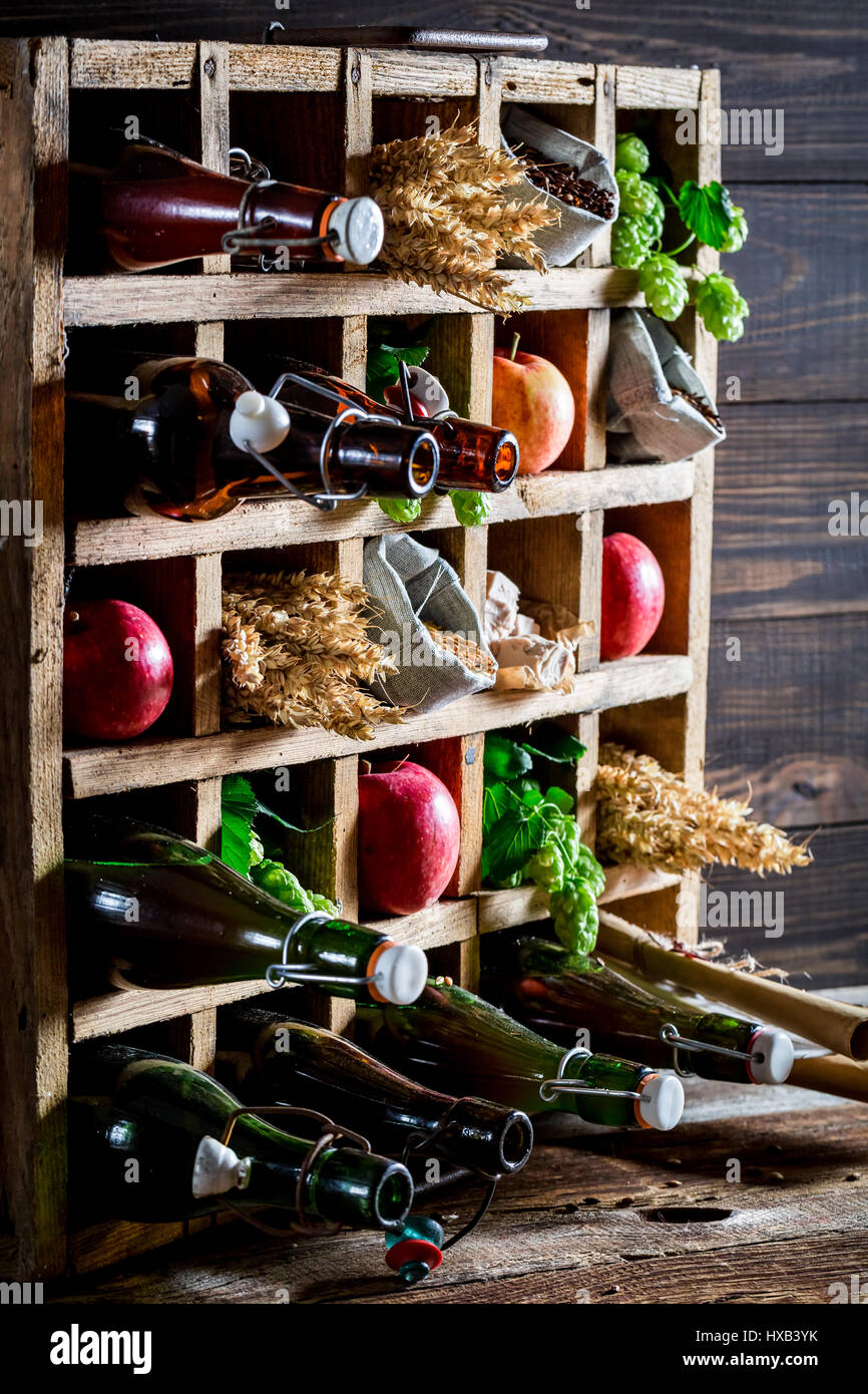 Various beer ingredients on old wooden table Stock Photo - Alamy