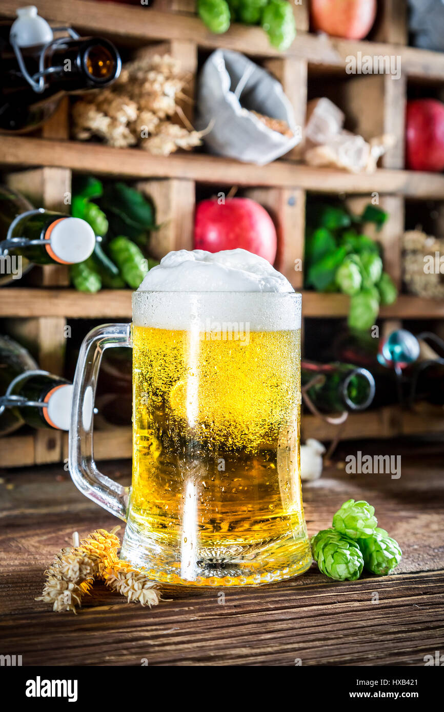 Fresh cider beer and ingredients in cellar Stock Photo - Alamy
