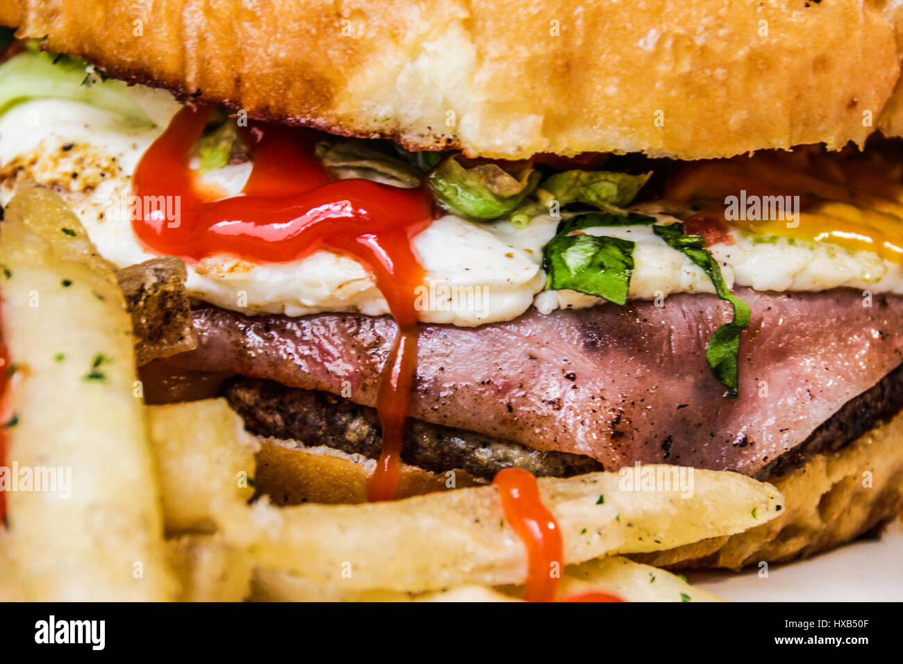 Photograph of a hamburger close up Stock Photo - Alamy