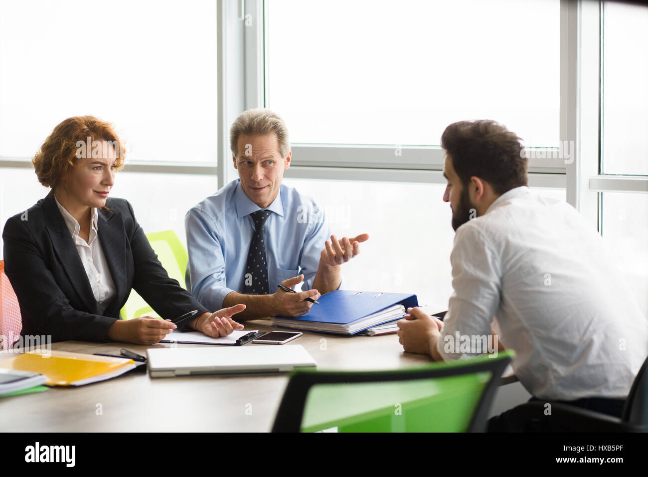 Communication between boss and worker Stock Photo - Alamy
