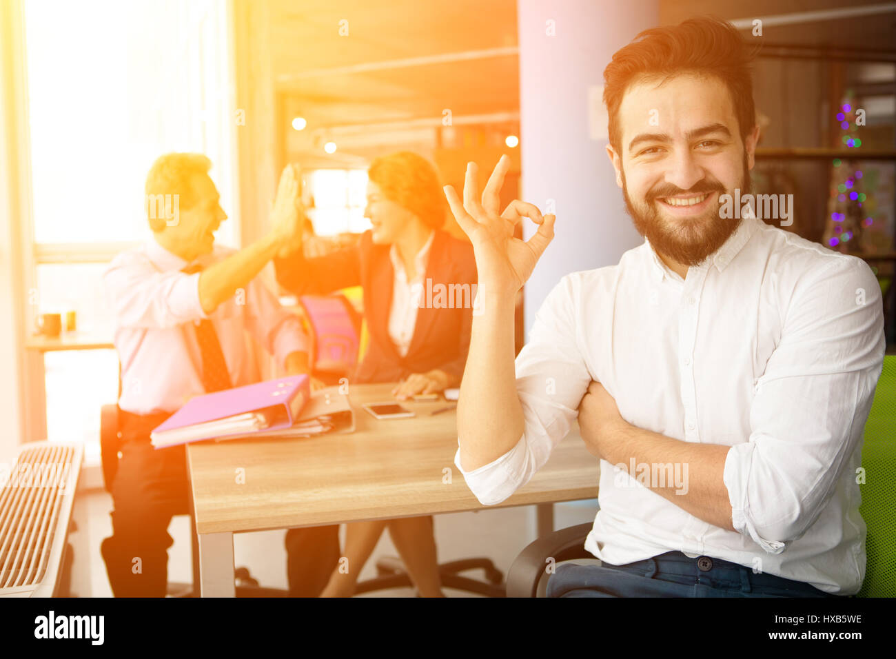 Happy interviewer in office Stock Photo - Alamy