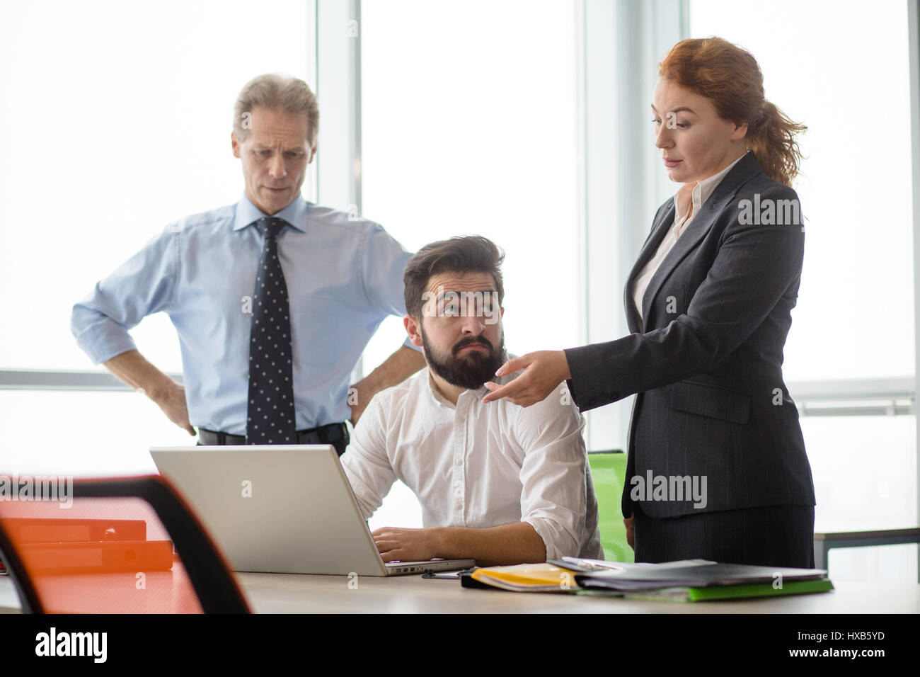 Angry boss screaming at workers Stock Photo - Alamy