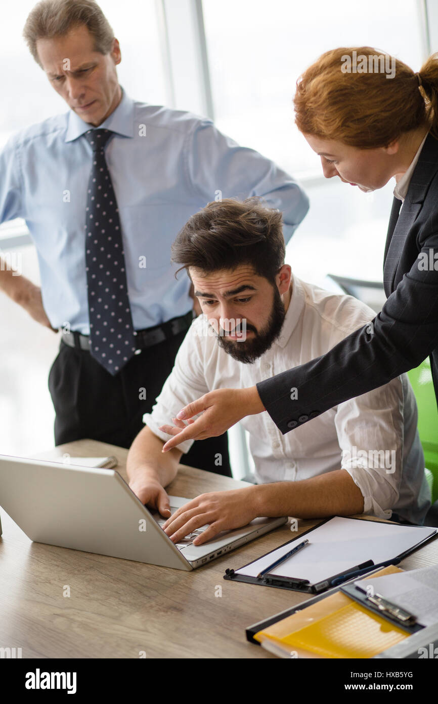 Angry boss screaming at workers Stock Photo - Alamy