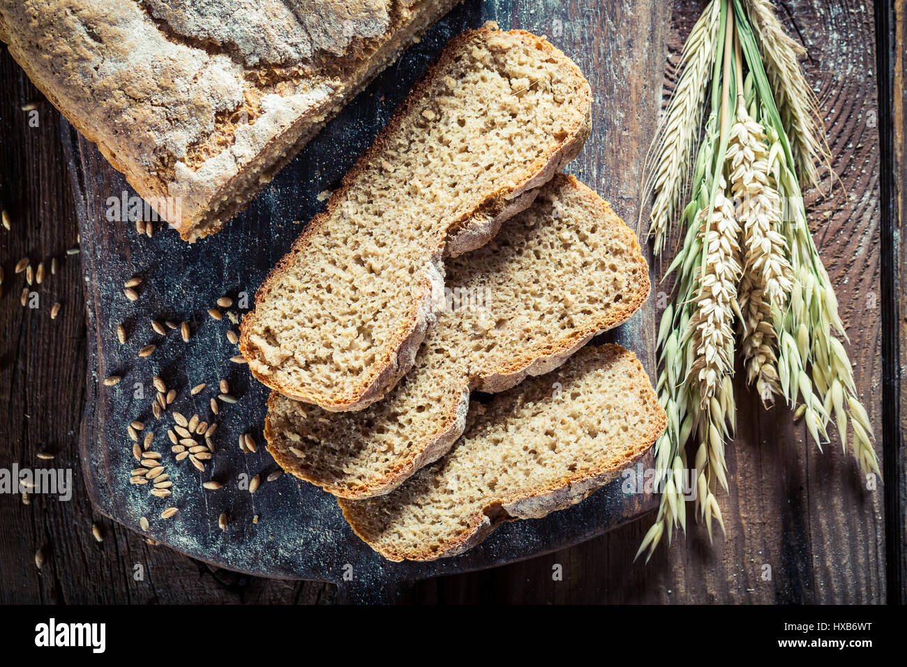 Fresh loaf of bread with several grains Stock Photo - Alamy