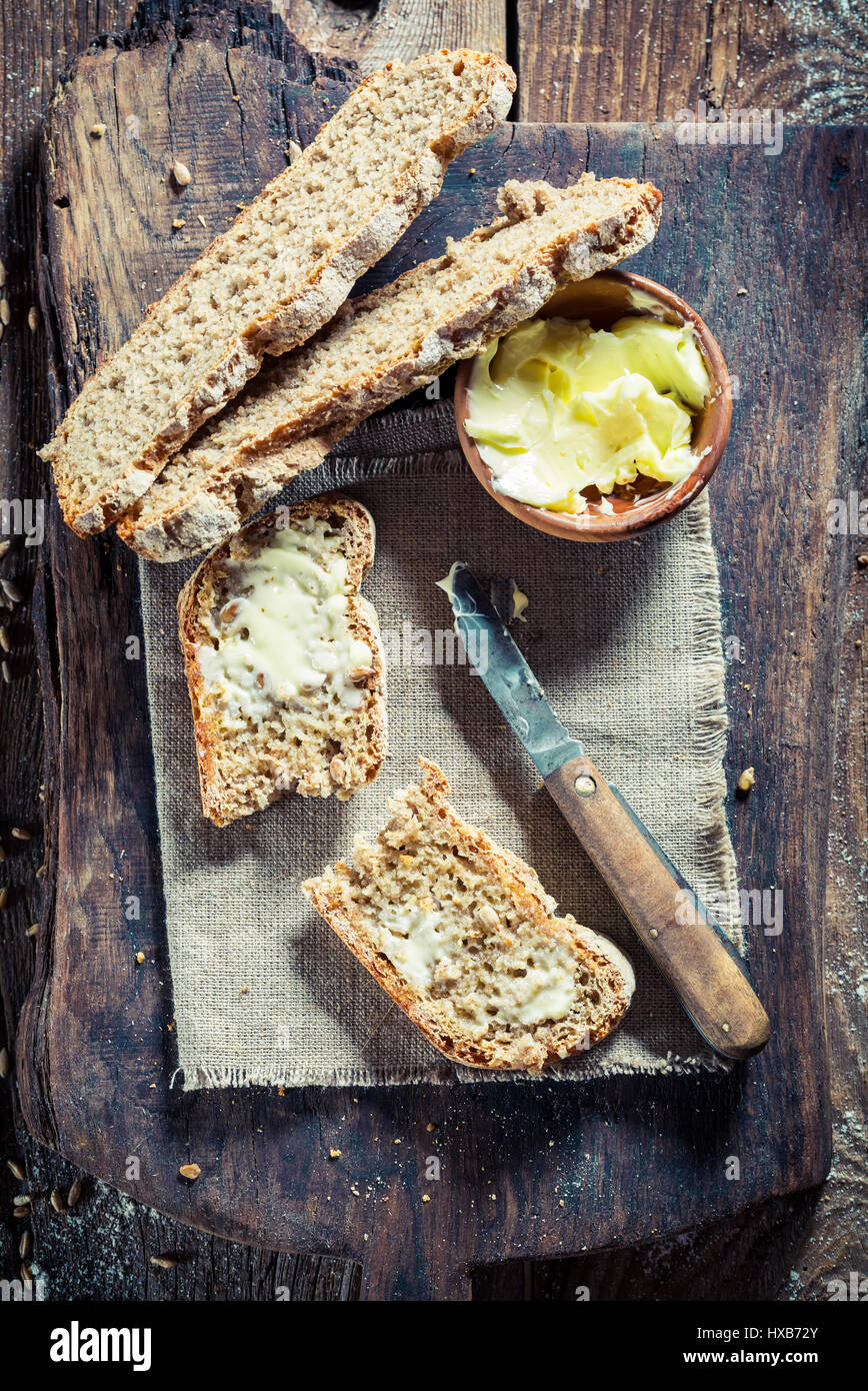 Delicious loaf of bread with whole grains for breakfast Stock Photo - Alamy