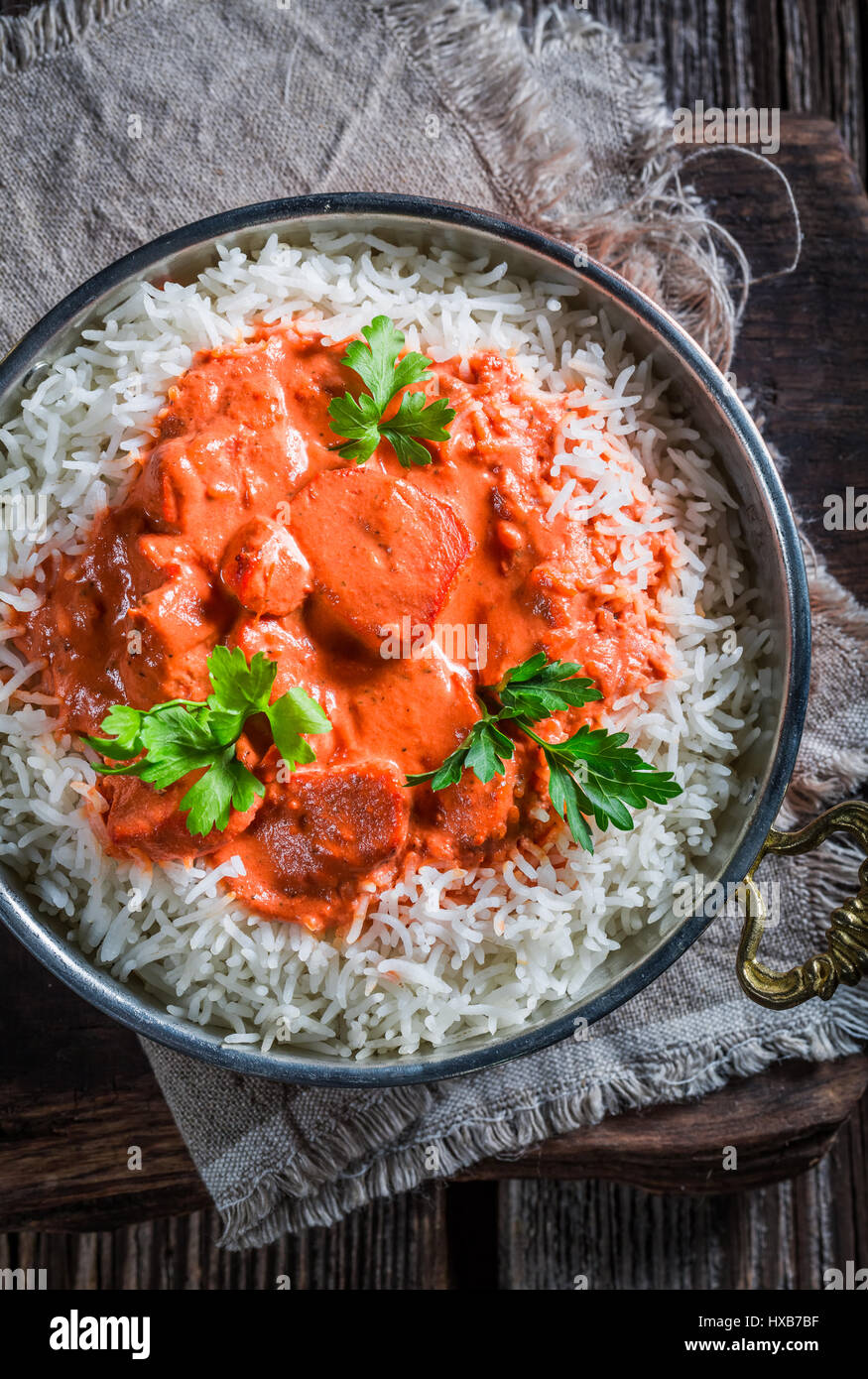 Indian tikka masala with rice and chicken Stock Photo - Alamy