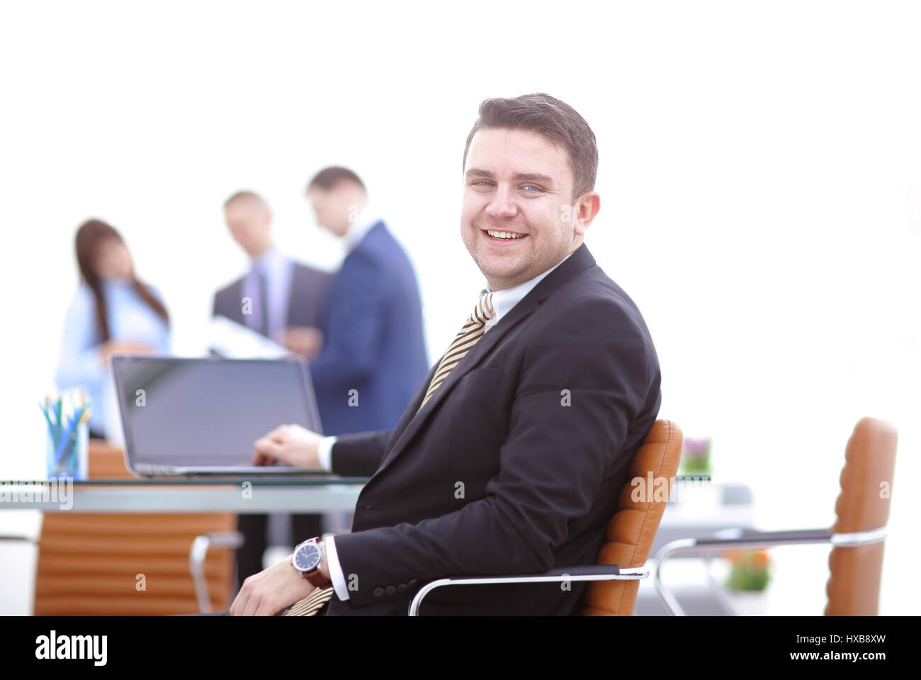 Employee looking at computer monitor during working day Stock Photo - Alamy