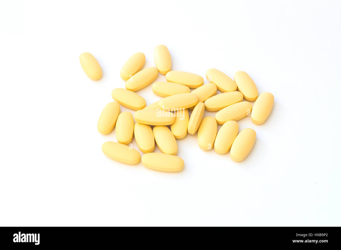 vitamin c pill isolated on white Stock Photo - Alamy