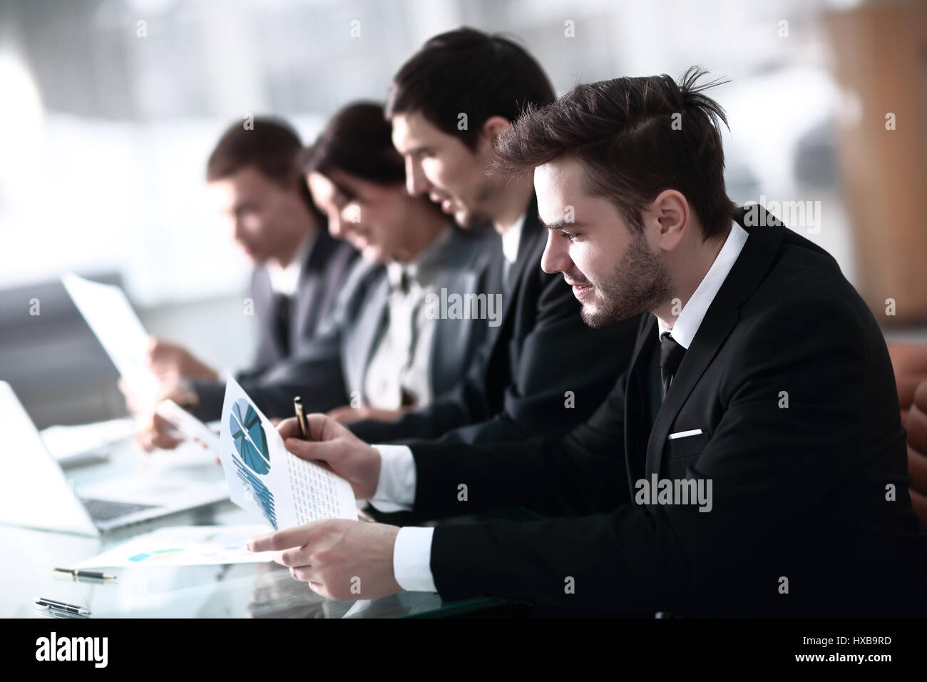 A group of successful businessmen. Discussion of the important contract ...