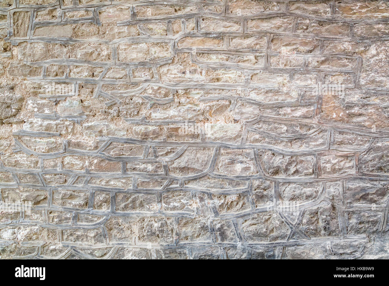 Weathered stone wall as background Stock Photo - Alamy