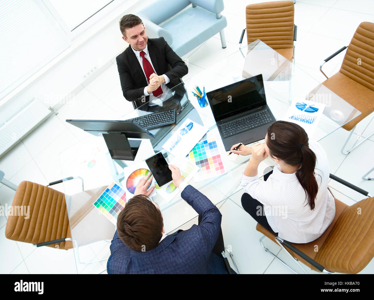 A group of successful businessmen. Discussion of the important contract ...