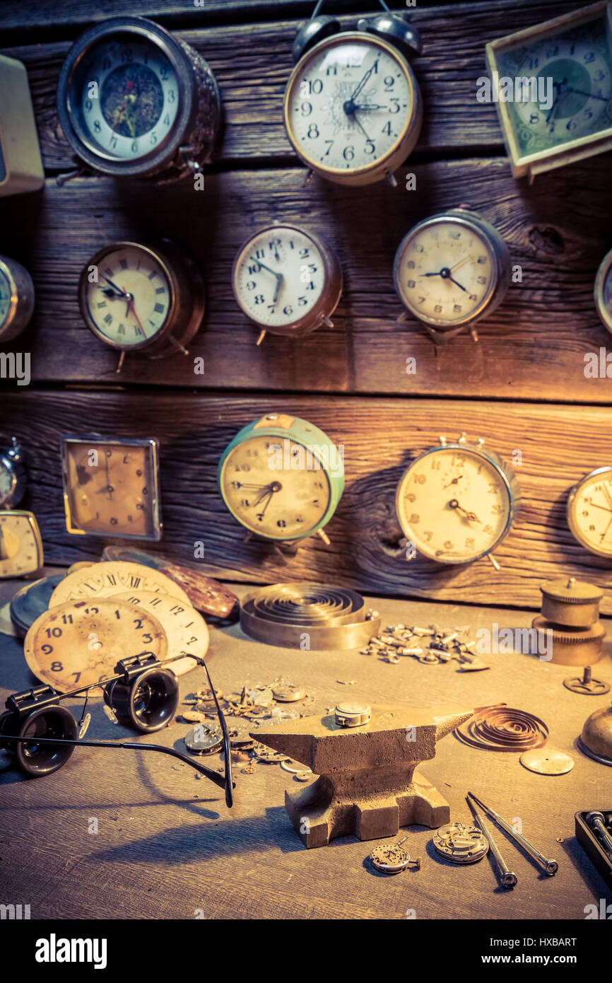 Old watchmaker's workshop with clocks to repair Stock Photo - Alamy