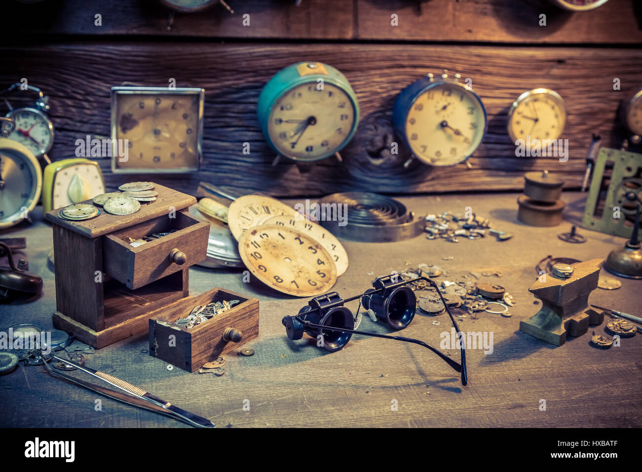 Old watchmaker's room with parts of clocks Stock Photo - Alamy