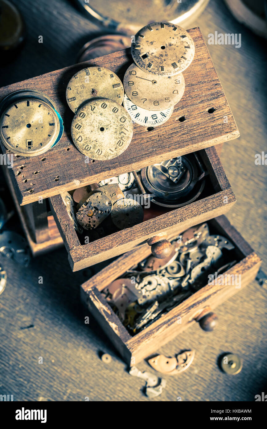 Vintage watchmaker's room with parts of clocks Stock Photo - Alamy