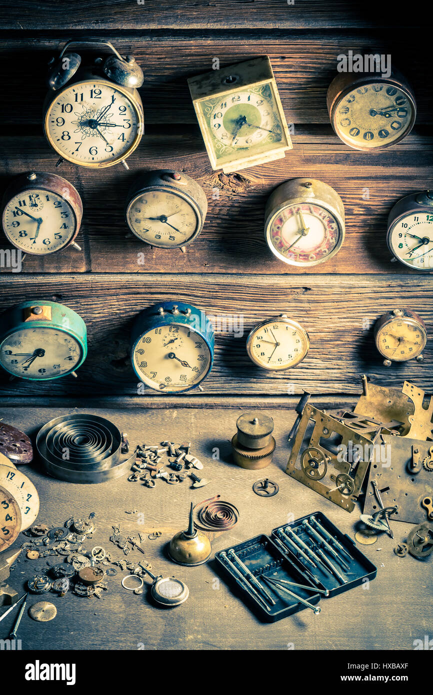 Small watchmaker's workshop with parts of clocks Stock Photo - Alamy