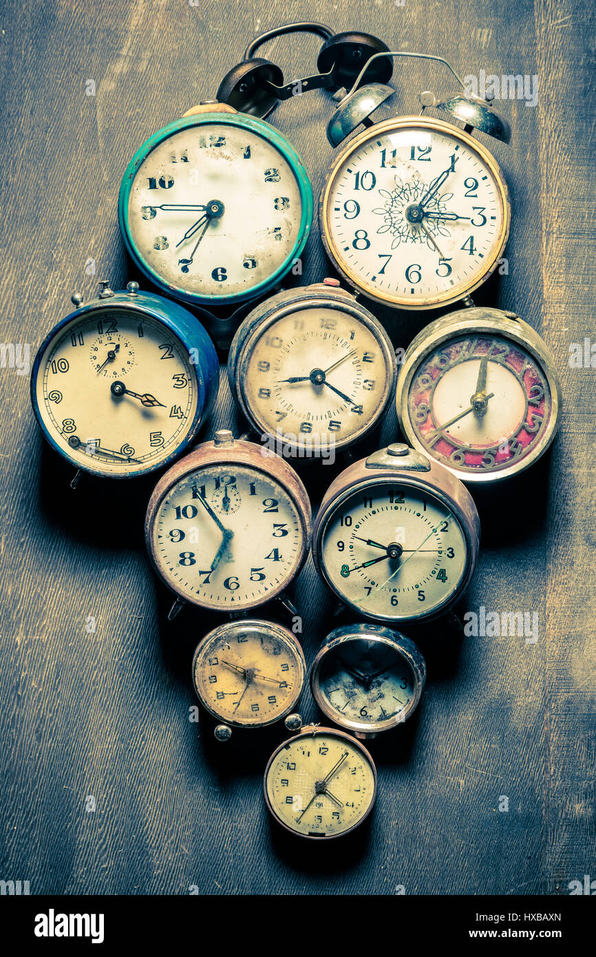Old clocks in pile Stock Photo - Alamy