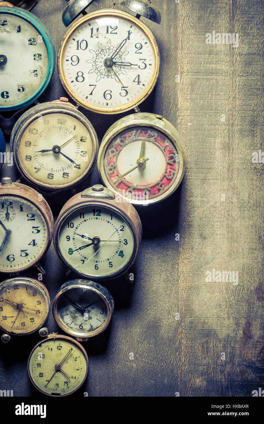 Old clocks in pile Stock Photo - Alamy