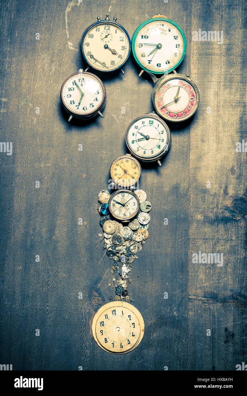 Questions mark arranged by clocks Stock Photo - Alamy