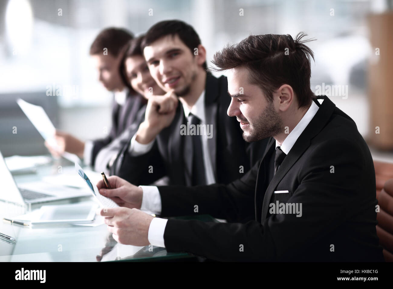 A group of successful businessmen. Discussion of the important contract ...