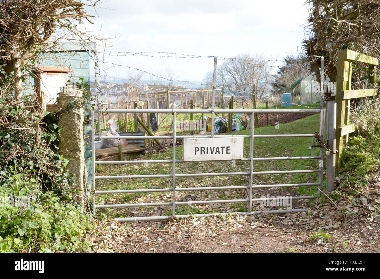 Sign attached to gate hi-res stock photography and images - Alamy