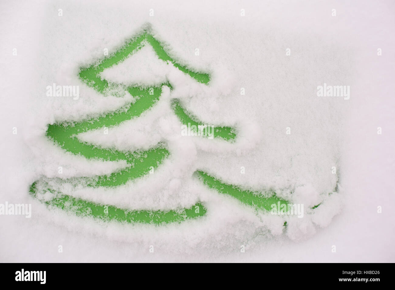 Handmade drawing in a snow on a green paper Stock Photo - Alamy