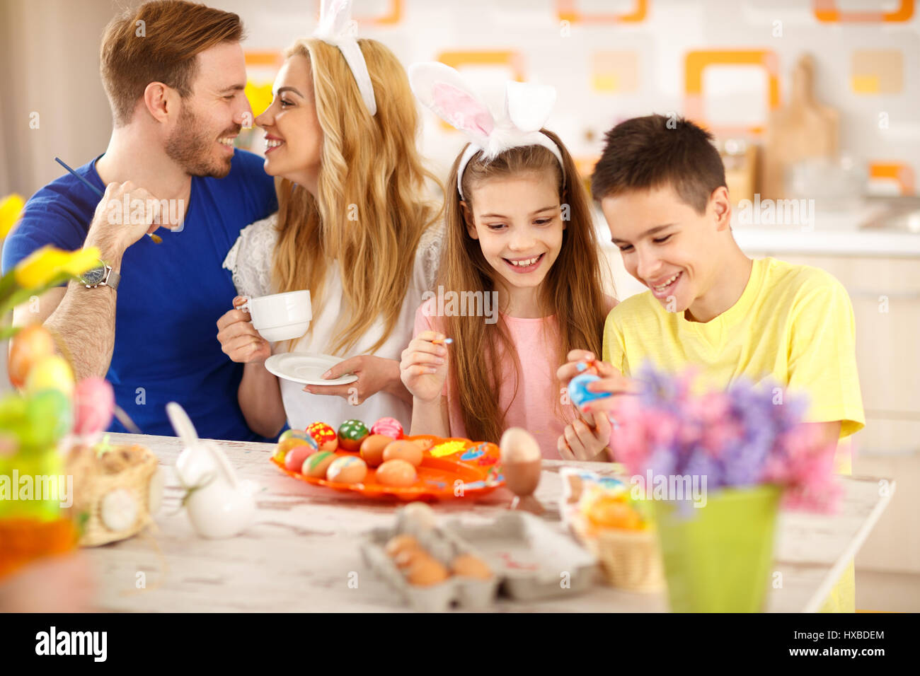 Family together in kitchen prepare Easter celebration Stock Photo - Alamy