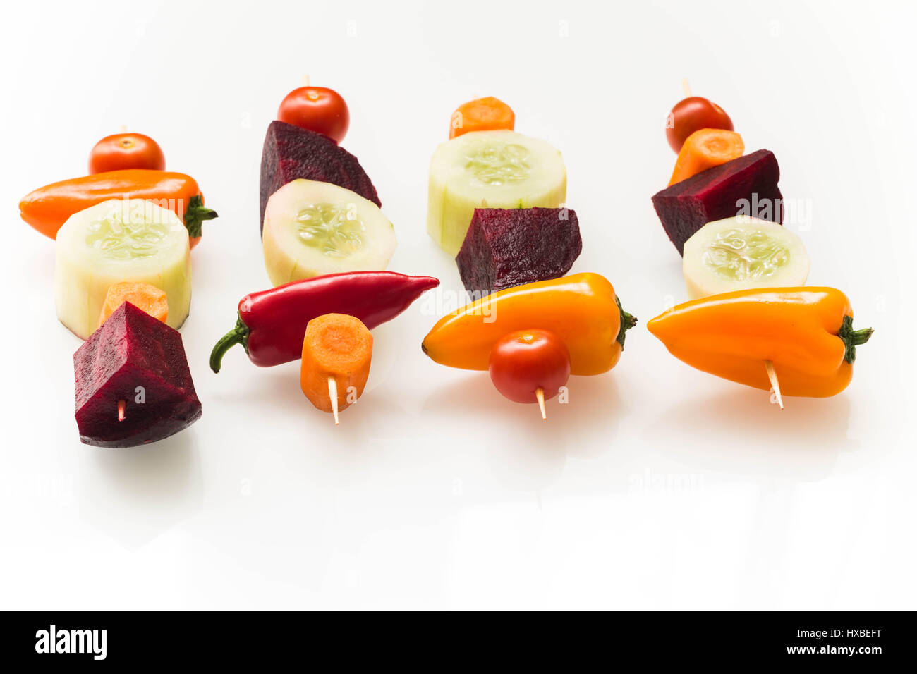 vegetables skewers on the white background / the concept of healthy ...