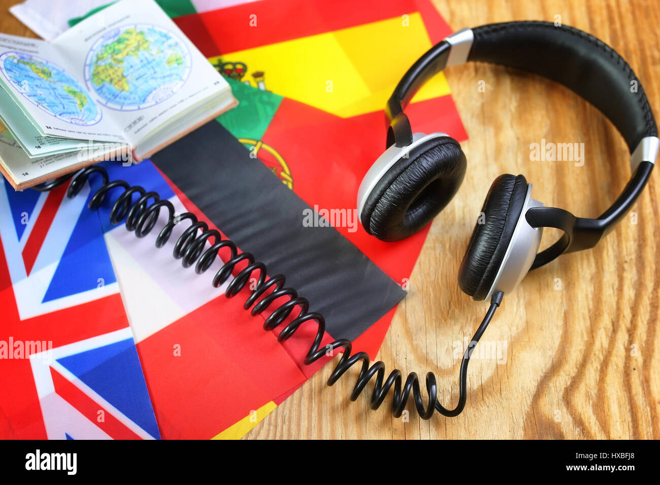 course language headphone and flag on a table Stock Photo - Alamy