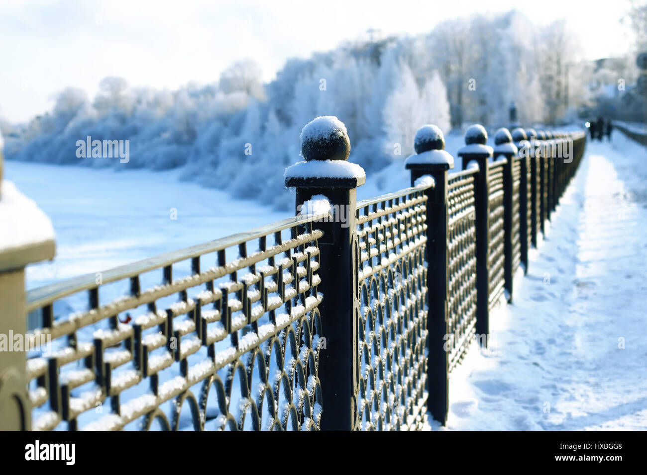fence covered snow winter park Stock Photo - Alamy