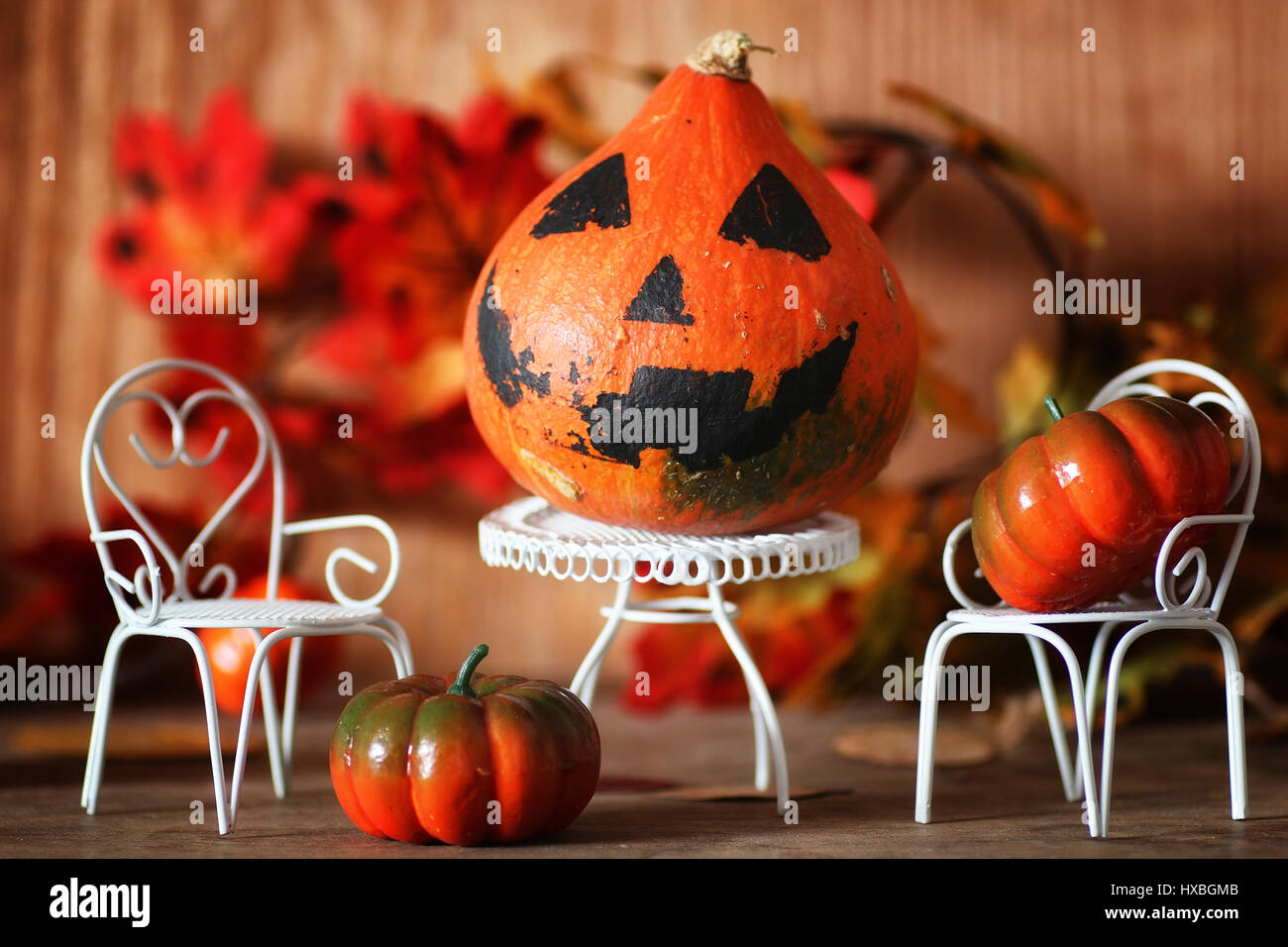 fresh pumpkin in interior wooden room on chair Stock Photo - Alamy