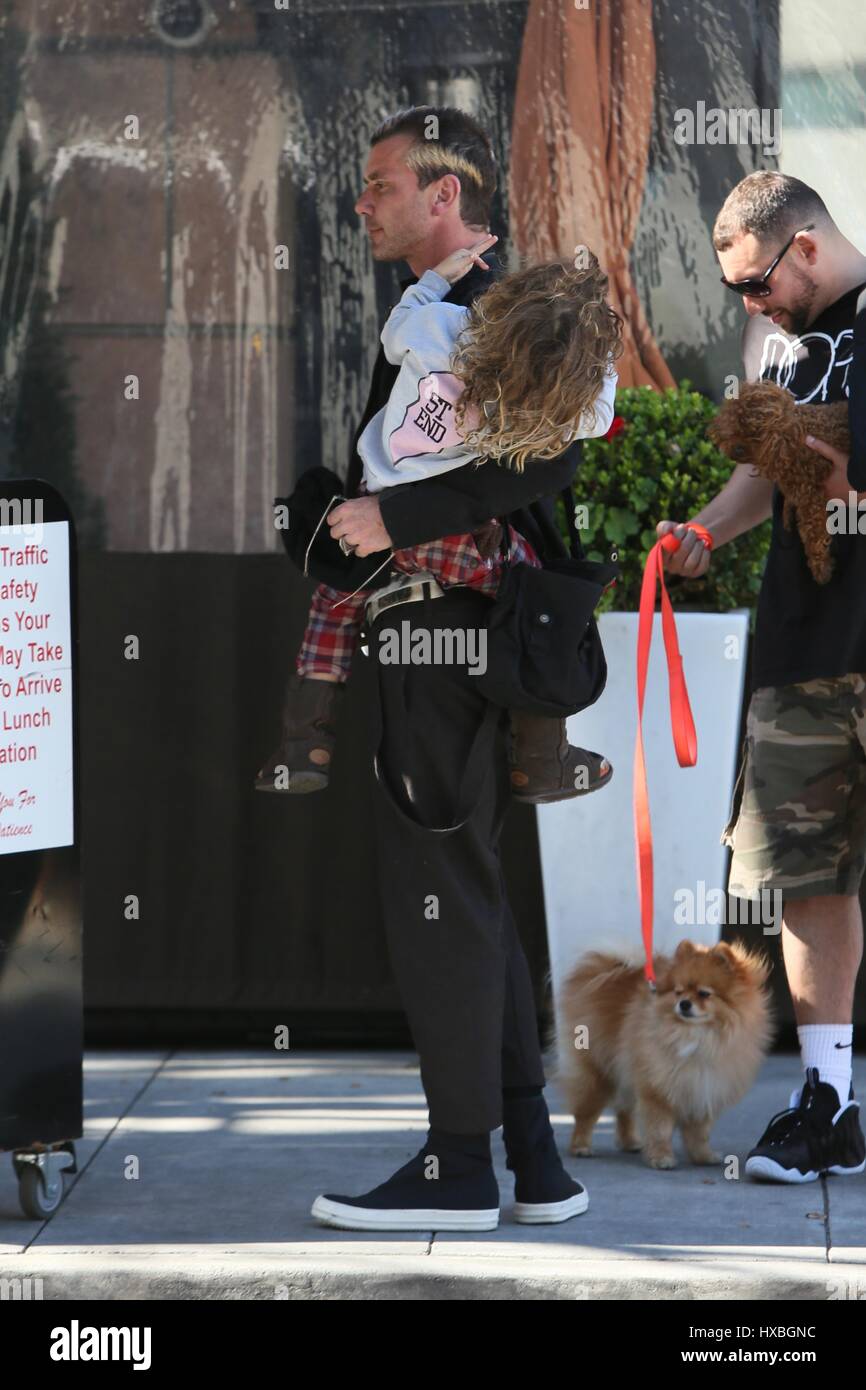 Gavin Rossdale and his son Apollo Bowie Flynn Rossdale wait at the Via ...