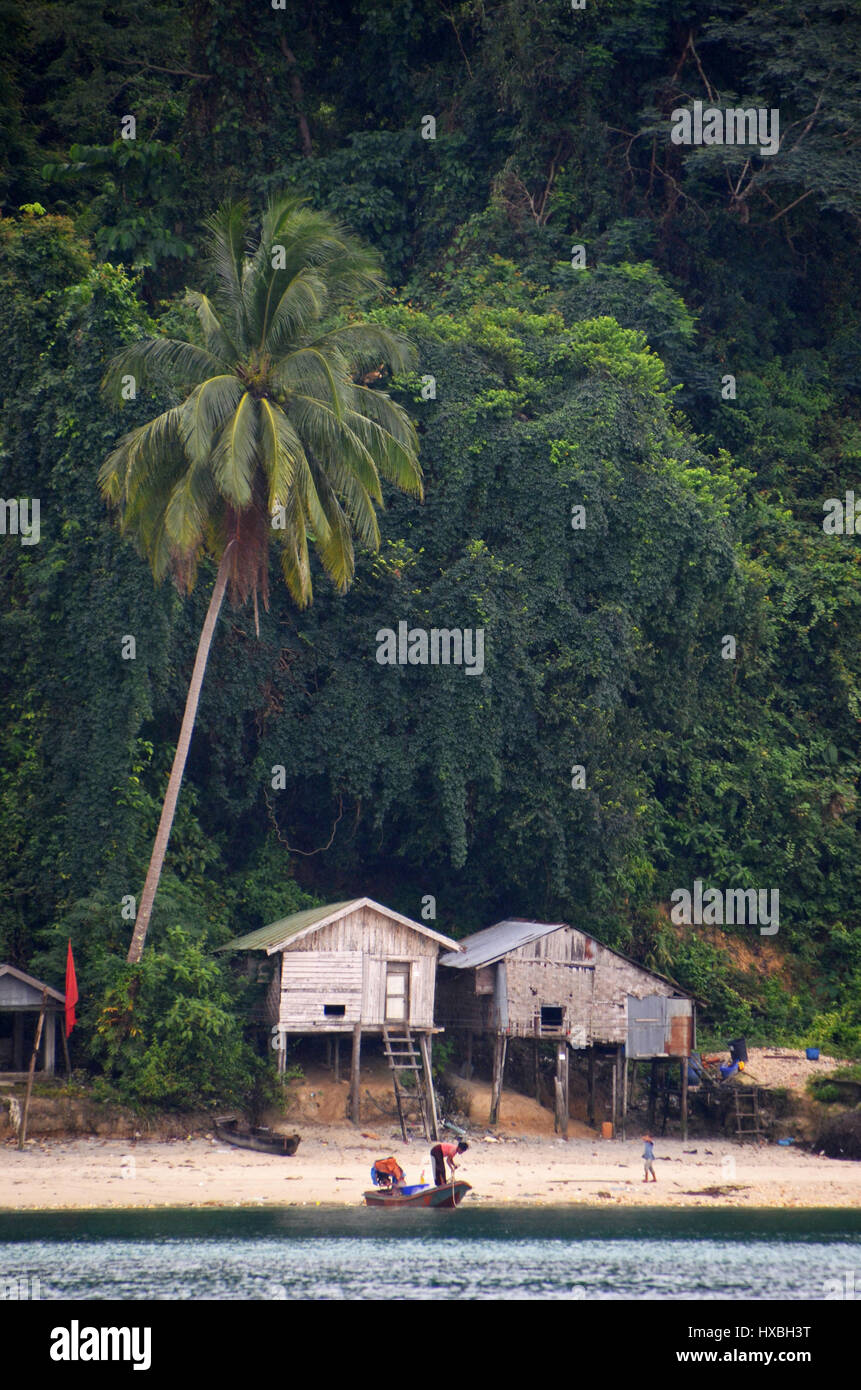 Moken stilt houses on the beachfront in the village of Makyone Galet ...