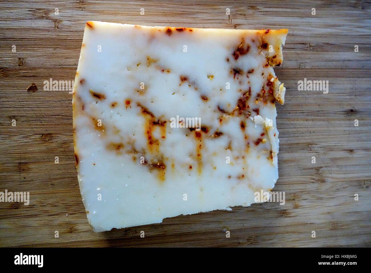 Greek Cuisine. Cretan Graviera Cheese with Chilli Stock Photo - Alamy